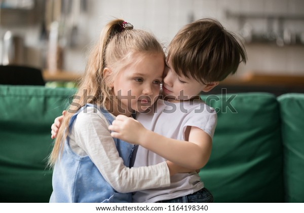 Little Boy Hugging Consoling Upset Girl Stock Photo 1164198340 ... Little Boy Hugging Consoling Upset Girl Stock Photo 1164198340 ...