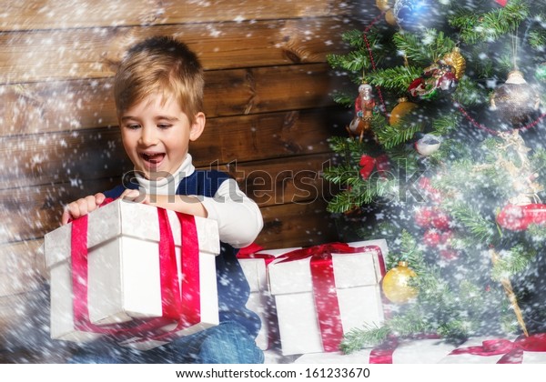 Little Boy Opening Gift Box Under Stock Photo (Edit Now) 161233670 Little Boy Opening Gift Box Under Stock Photo (Edit Now) 161233670