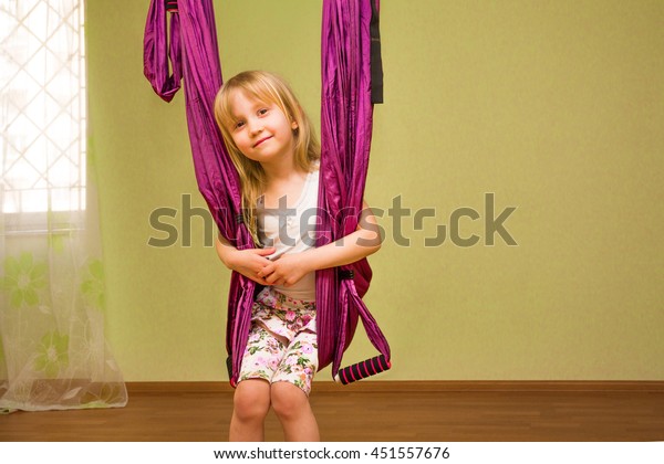 Little Girl Making Aerial Yoga Exercises Stock Photo 451557676 ... Little Girl Making Aerial Yoga Exercises Stock Photo 451557676 ...