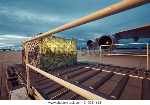 Loading Cargo Freight Aircraft Stock Photo (Edit Now) 240184669
