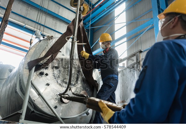 Lowangle View Two Workers Handling Equipment Stock Photo 578544409 ...
