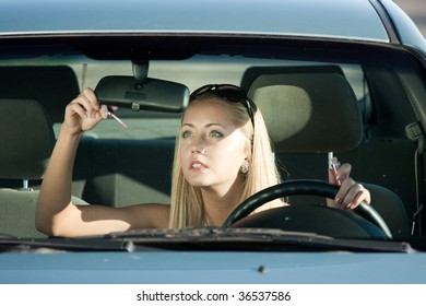 Woman applying makeup car Images, Stock Photos & Vectors | Shutterstock