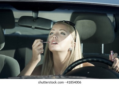 Woman applying makeup car Images, Stock Photos & Vectors | Shutterstock