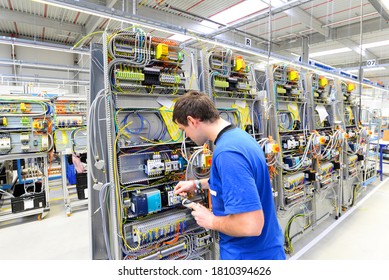 Young Operator Assembles Machine Modern High Stock Photo 1551713267 ...
