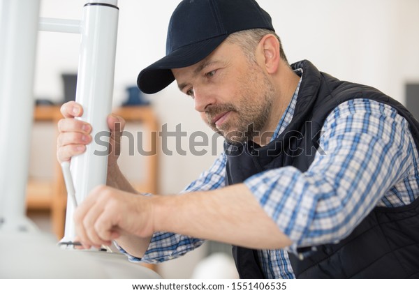 Man Assembling Metal Stool Stock Photo 1551406535 | Shutterstock