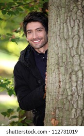 10,762 Man behind tree Images, Stock Photos & Vectors | Shutterstock