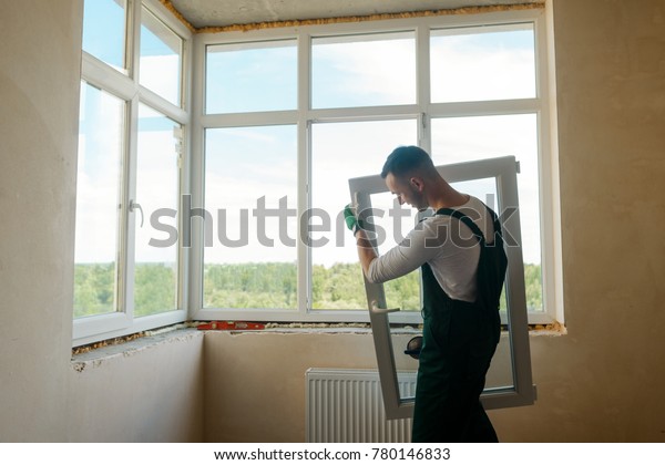 Man Carrying Window Sash Using Vacuum Stock Photo 780146833 | Shutterstock