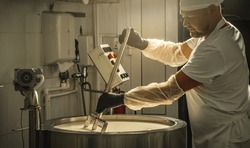 Cheese production factory, an Industrial Photo by REDDOT Studio