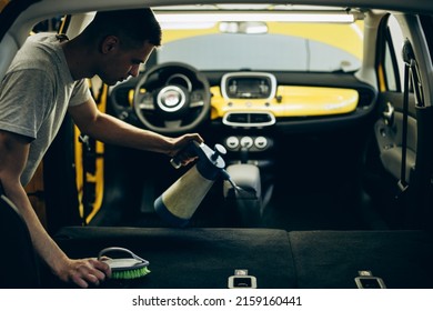 Man Cleaning Inside Car Using Spray Stock Photo 2159160441 | Shutterstock
