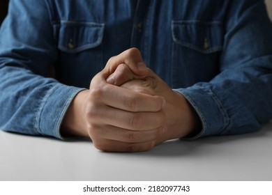 Man Clenching Hands Table While Restraining Stock Photo 2182097743 ...