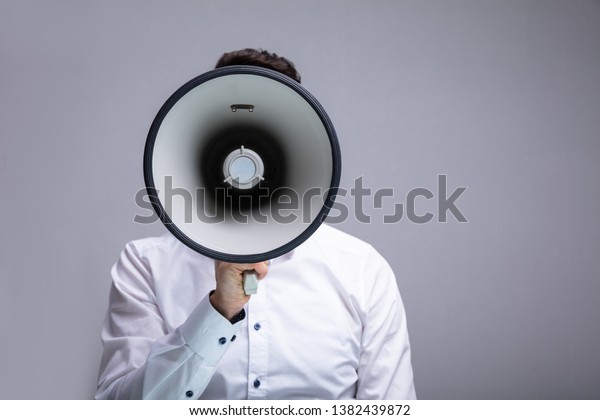 Man Doing Announcement Using Megaphone Against Stock Photo (Edit Now ...