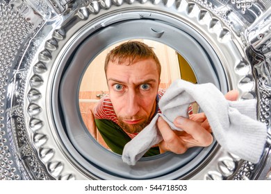 Man Doing Laundry Reaching Inside Washing Stock Photo (Edit Now) 549320560