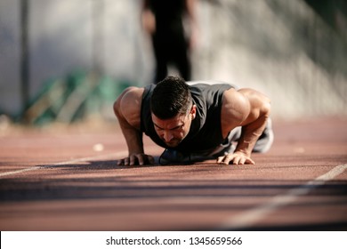 Man Doing Push Trainer Exercises Outdoors Stock Photo 1345659566 ...