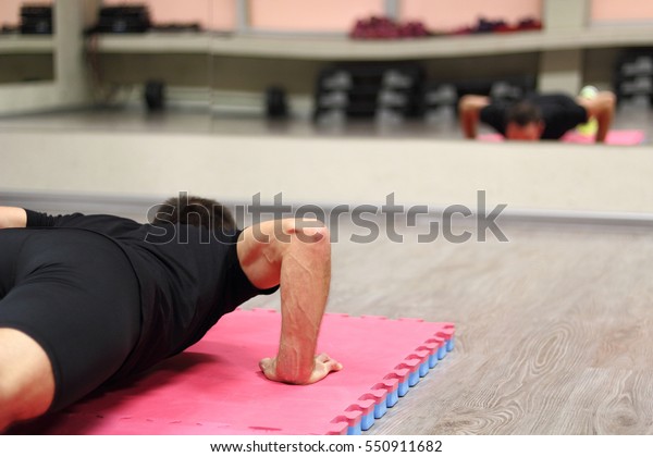 Man Doing Pushup On Exercise Mat Stock Photo 550911682 | Shutterstock