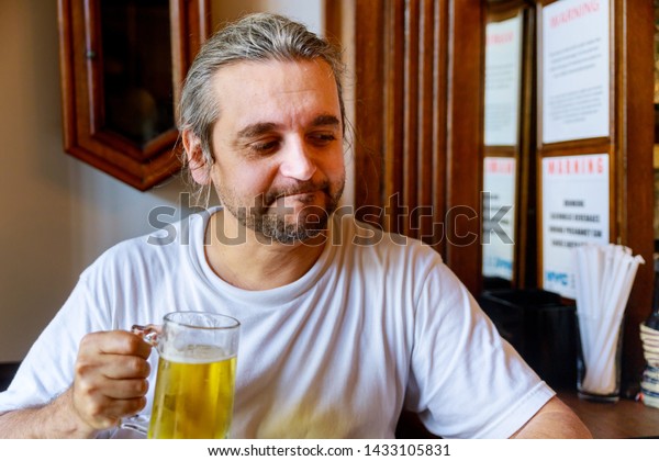 Man Drinking Beer Side View Handsome Stock Photo 1433105831 | Shutterstock