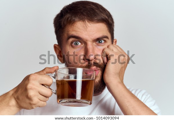 Man Drinking Tea On Light Background Stock Photo 1014093094 | Shutterstock