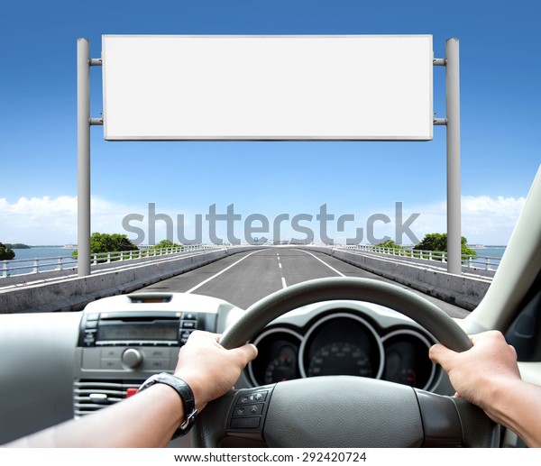 Man Driving Car While Looking Billboard Stock Photo (Edit Now) 292420724