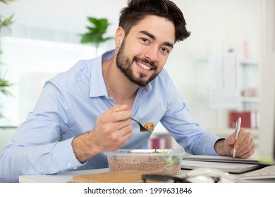 Man Eating Lunch While Working Office Stock Photo 1999631846 | Shutterstock