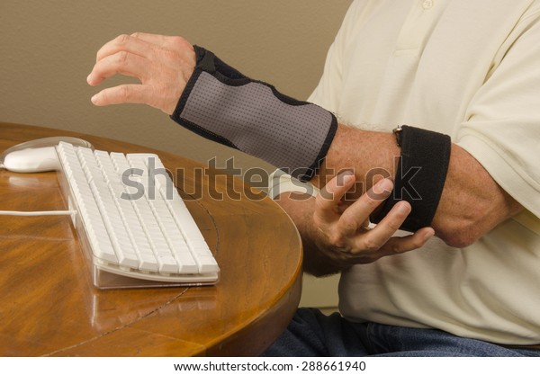 Man Experiencing Computer Use Pain Tendinitis Stock Photo 288661940 ...