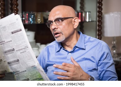 Man Gets Shocked While Reading Newspaper Stock Photo 1998417455 ...