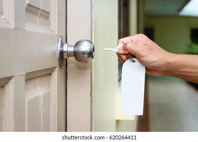 Man Hand Inserting Key Into Door Stock Photo 620264411 | Shutterstock