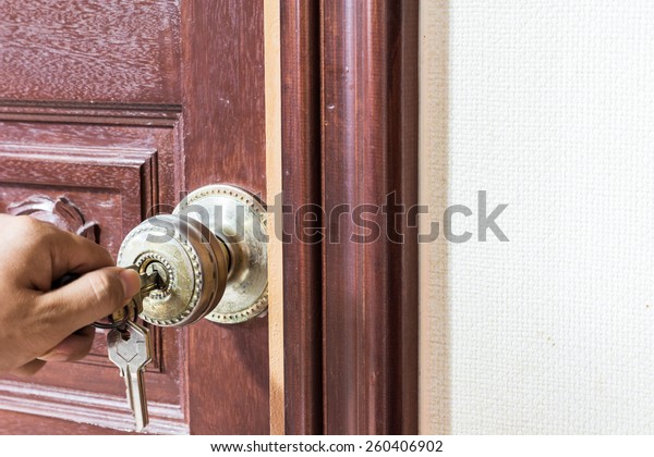 Man Hand Locking Door Stock Photo 260406902 | Shutterstock