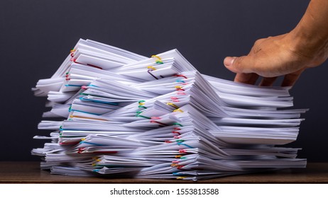 Man Hand Pick Stack Overload Document Stock Photo 1553813588 | Shutterstock