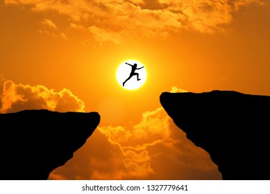 Man Jump Through Gap Between Hill Stock Photo 385314769 | Shutterstock
