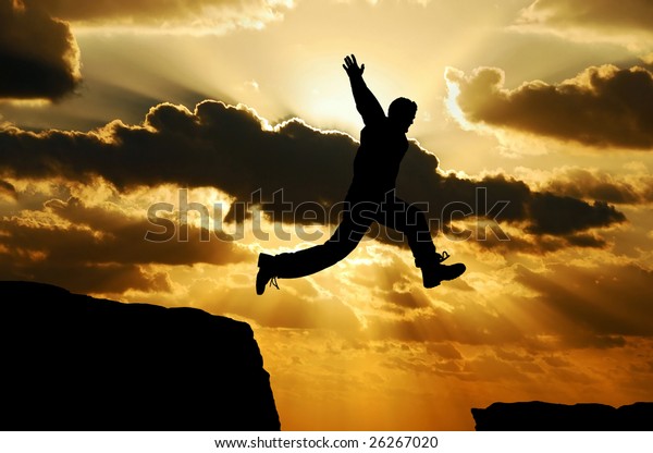 Man Jumping Over Gap Stock Photo (Edit Now) 26267020