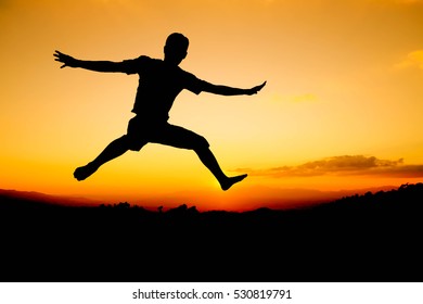 Man Jumping Sunset Background Stock Photo 530819791 | Shutterstock