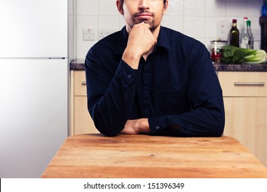 Man Kitchen Table Thinking Stock Photo 151396349 | Shutterstock