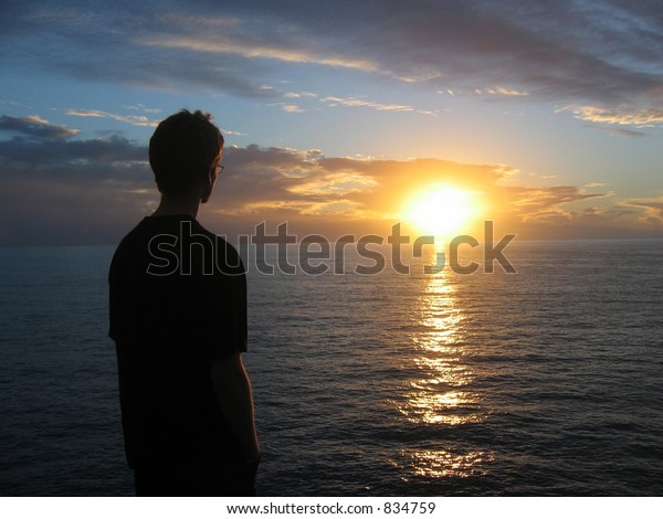 Man Looking Into Sunset Stock Photo (Edit Now) 834759