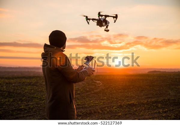 Man Operating Drone Remote Control Dark Stock Photo (Edit Now) 522127369
