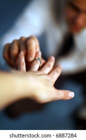 Man Proposing Putting Ring On Womans Stock Photo 6887284 | Shutterstock