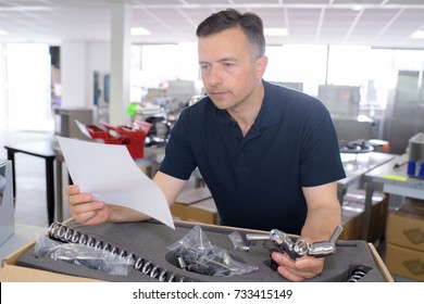Man Reading Assembling Instruction Paper Stock Photo 733415149 ...