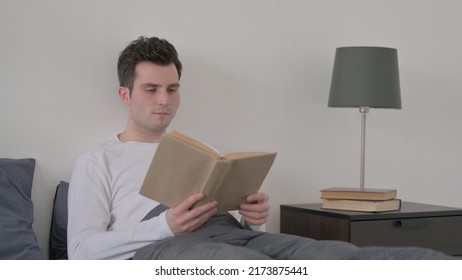 557 Man laying down reading Images, Stock Photos & Vectors | Shutterstock