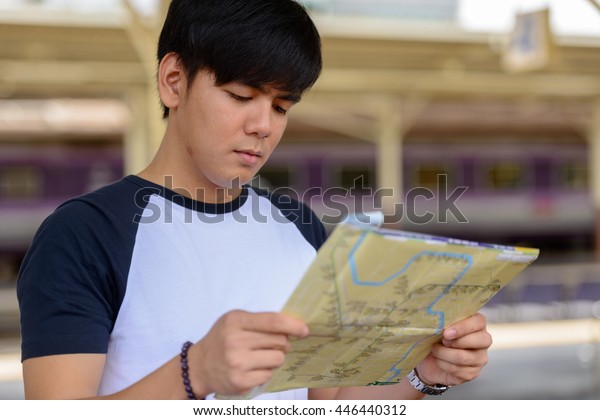 Man Reading Map Stock Photo 446440312 | Shutterstock