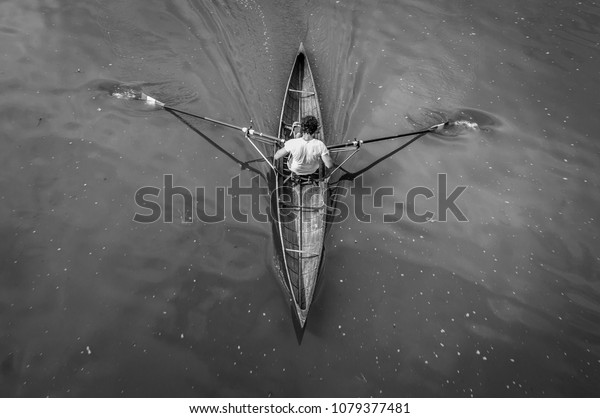 Man Rowing River Stock Photo (Edit Now) 1079377481