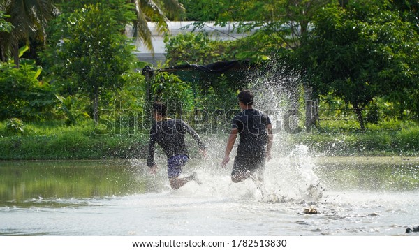 Man Running Playing Rice Fields Stock Photo (Edit Now) 1782513830