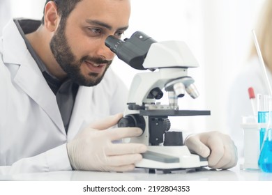 Man Scientist Looking Through Microscope Doing Stock Photo 2192804353 ...