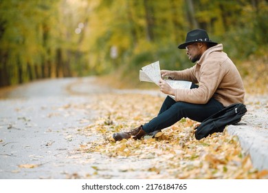 Man Sitting On Road Looking Map Stock Photo 2176184765 | Shutterstock