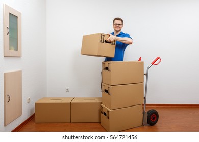 Man Stacking Boxes On Top Each 스톡 사진 564721456 | Shutterstock