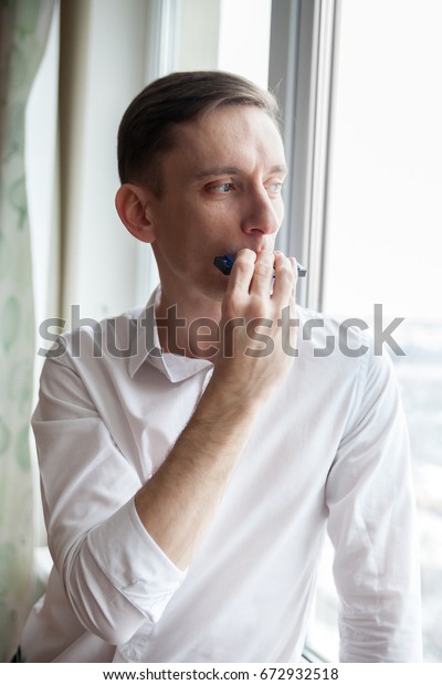 Man Standing Window Harmonica Stock Photo 672932518 | Shutterstock