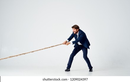 Man Suit Pulls Rope Stock Photo 1209024397 | Shutterstock