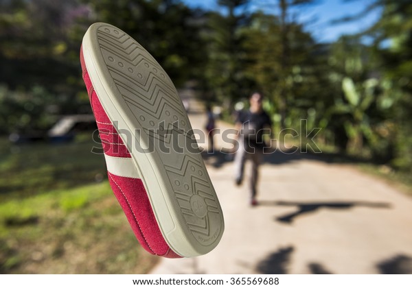 Man Throw Shoe Camera Stock Photo 365569688 | Shutterstock