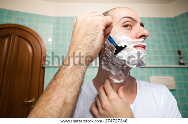 Man Using Disposable Razor Shave His Stock Photo 274727348 | Shutterstock