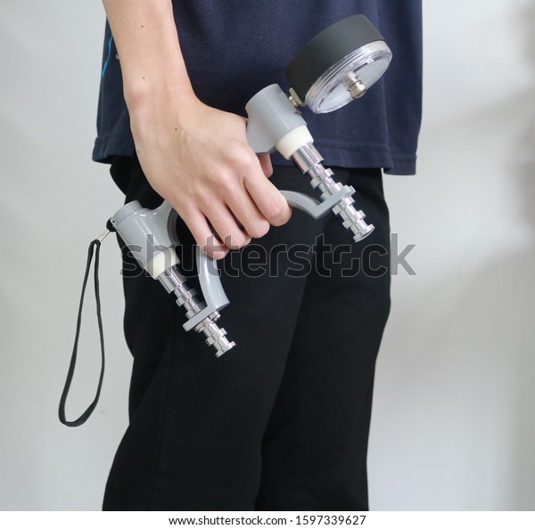 Man Using Grip Strength Dynamometer Testing Stock Photo 1597339627 ...