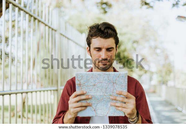 Man Using Map Downtown Park Stock Photo 1339078535 | Shutterstock