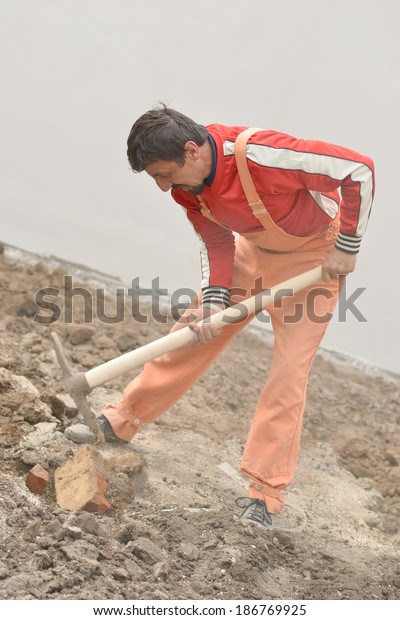 Man Using Sledgehammer Stock Photo 186769925 | Shutterstock