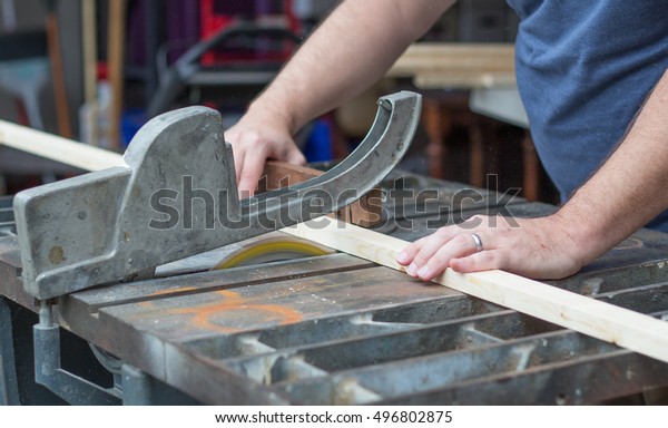 Man Using Table Saw Cut Plank Stock Photo 496802875 | Shutterstock